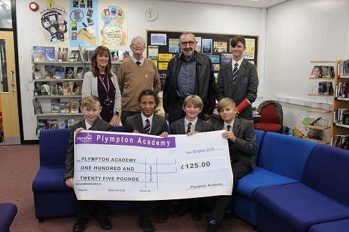 Plympton Academy receive cheque donation for new books | The Devon Daily